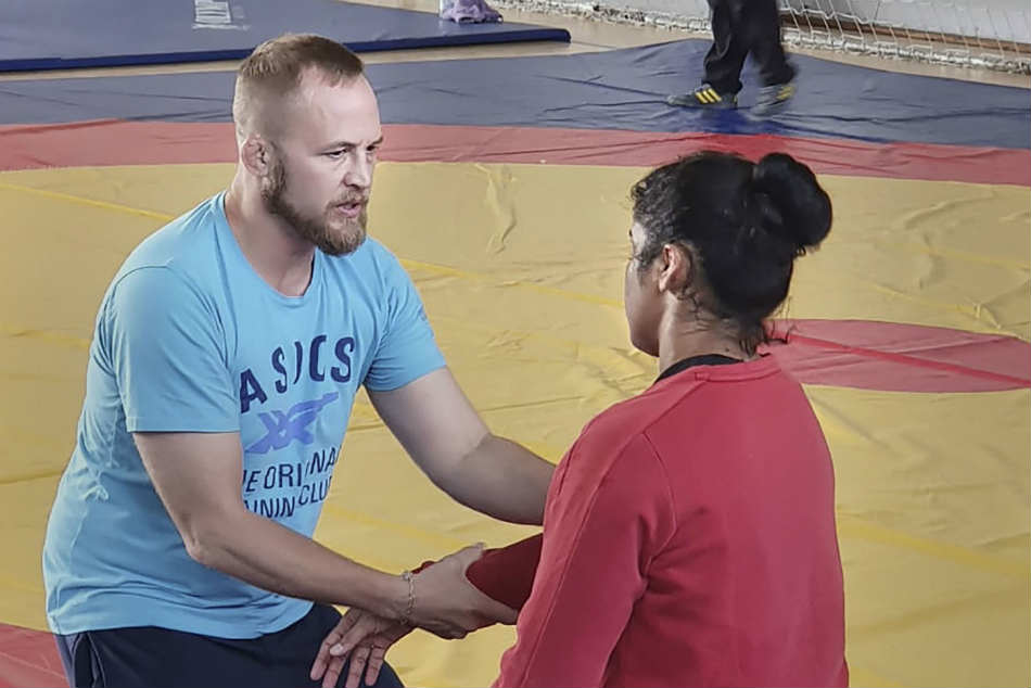 WFI set to terminate women's wrestling coach Andrew Cook over salary ...