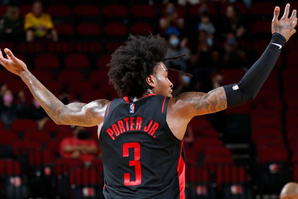 Porter scores 50 in wild Rockets win as Bucks lose Giannis, Warriors ...