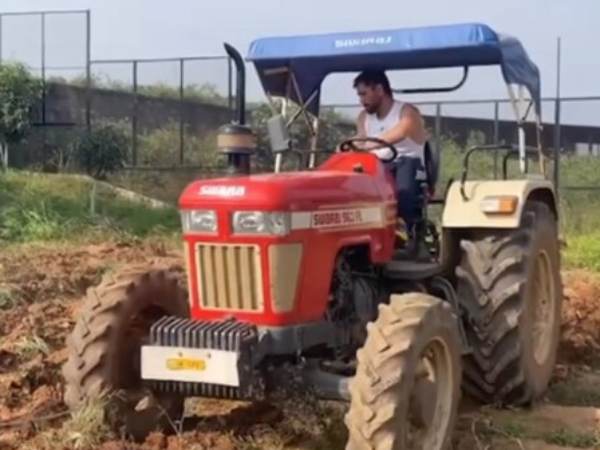 MS Dhoni turns farmer, ploughs field at his Ranchi-based farmhouse with ...